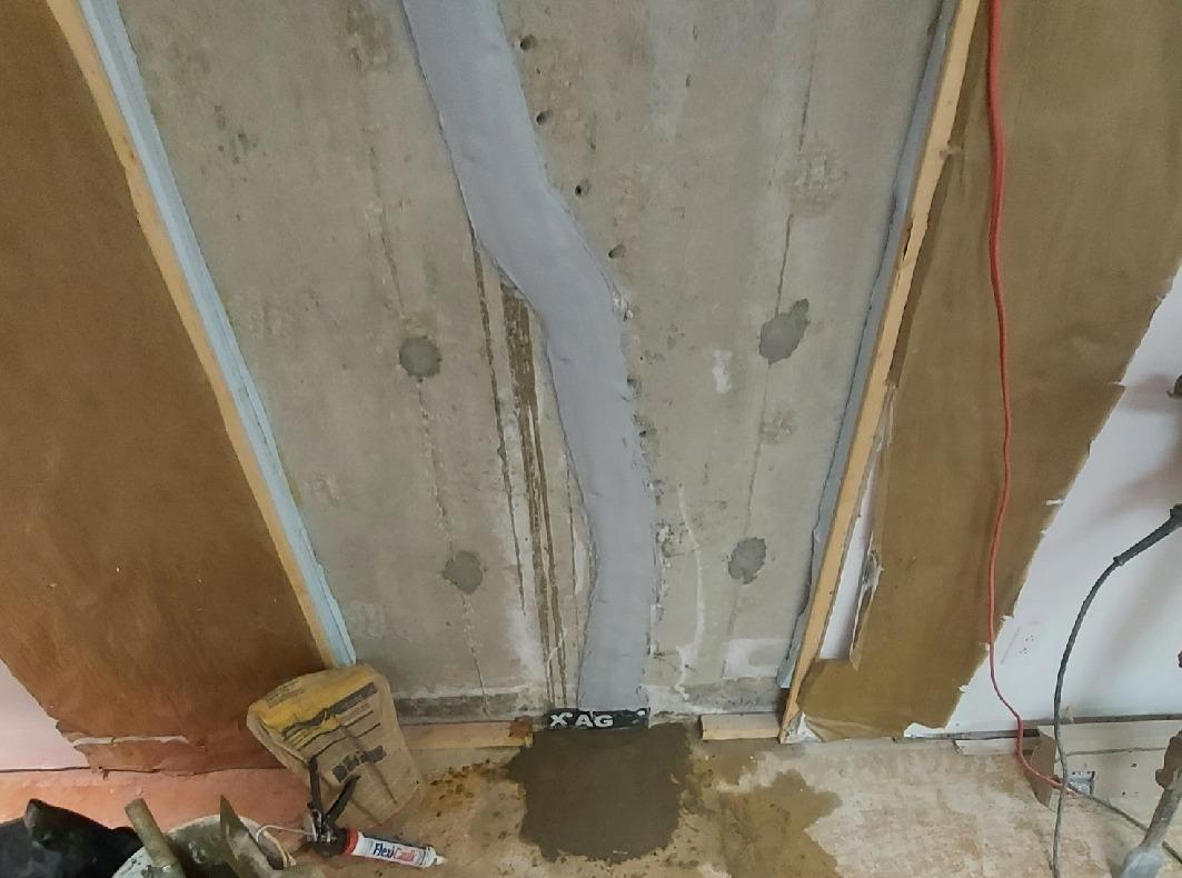 Réparation de fissures du plancher et des murs du sous-sol au ...