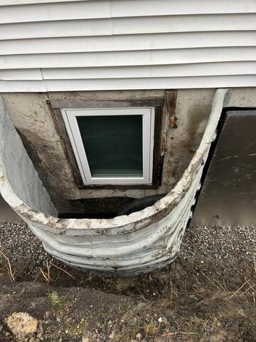 Basement Waterproofing - Rockwell Egress Window Well Secured in ...