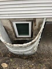 Basement Waterproofing - Rockwell Egress Window Well Secured in ...