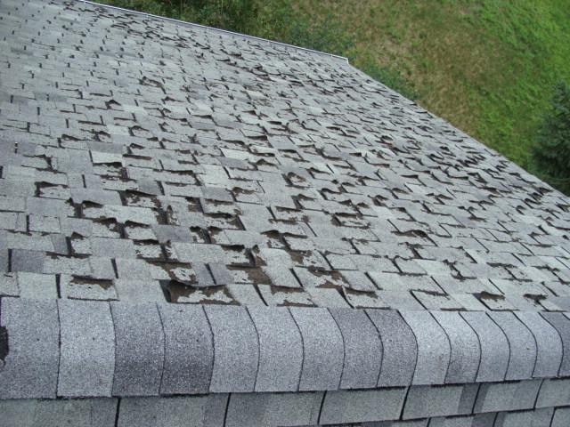 In Need Of A New Roofing System - curled shingles