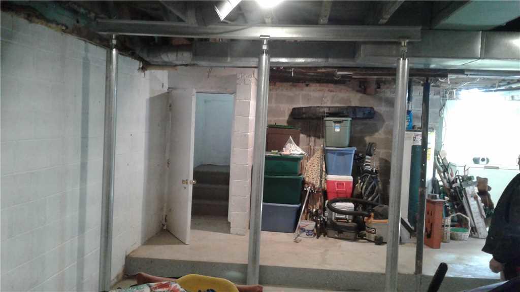 Basement Waterproofing - Resolving a Sunken Floor in Lena, WI ...