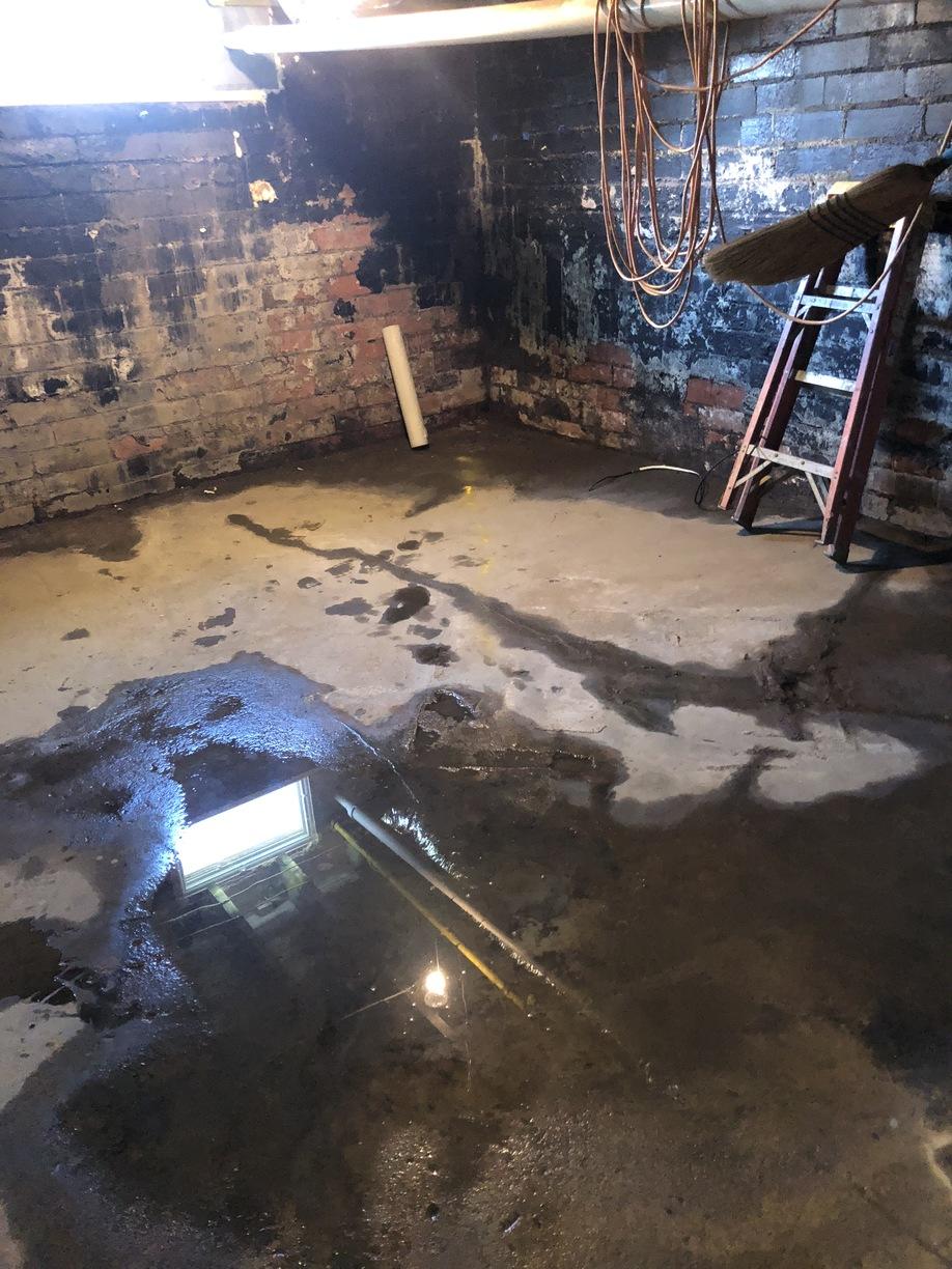 Basement Waterproofing - Cracks in Floor Causing a Leaky Basement in ...