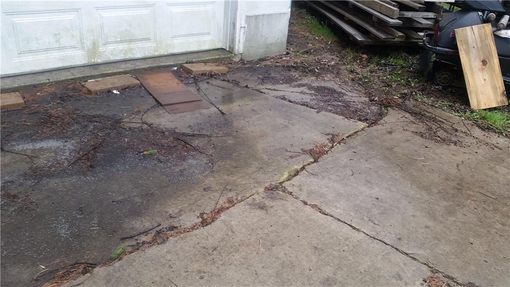 Concrete Lifting and Leveling - Badly Sunken Concrete in Woodville, WI ...