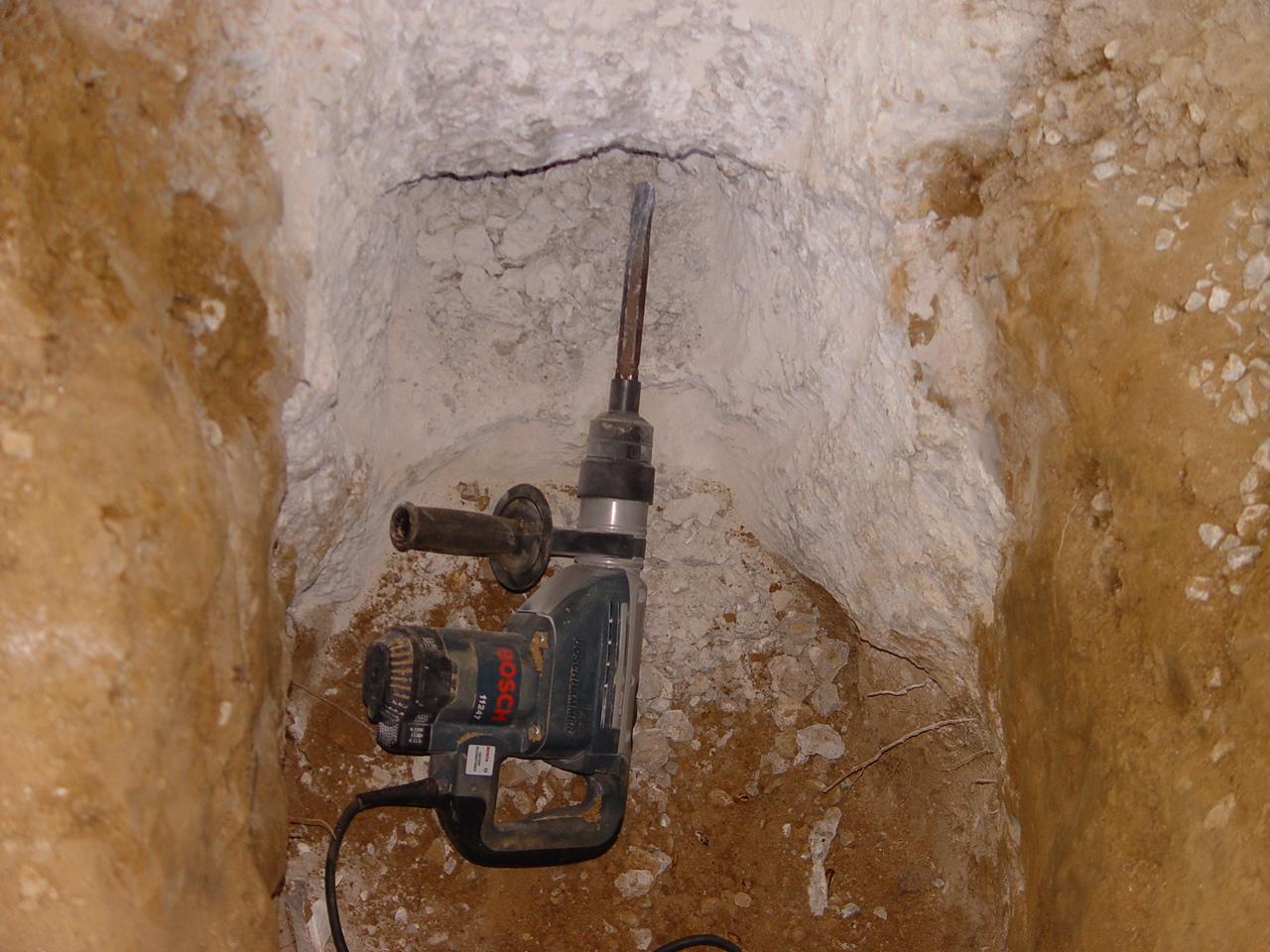 Foundation Repair - Falling Down the Hill - Exposed Footing