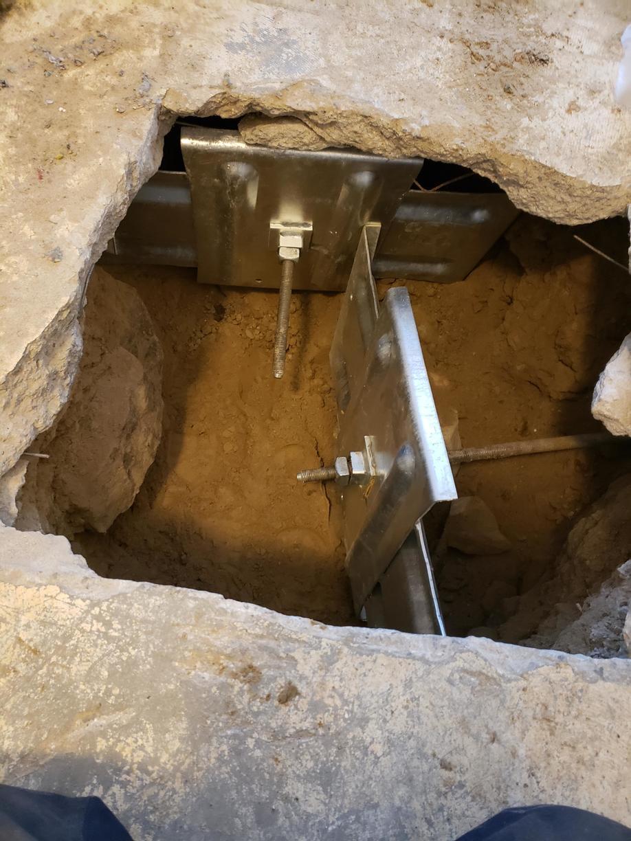 Erickson Foundation Solutions Photo Album - Leaning Foundation on Slope ...