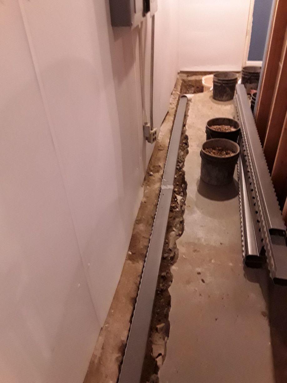 Basement Waterproofing - Installing WaterGuard - WaterGuard System