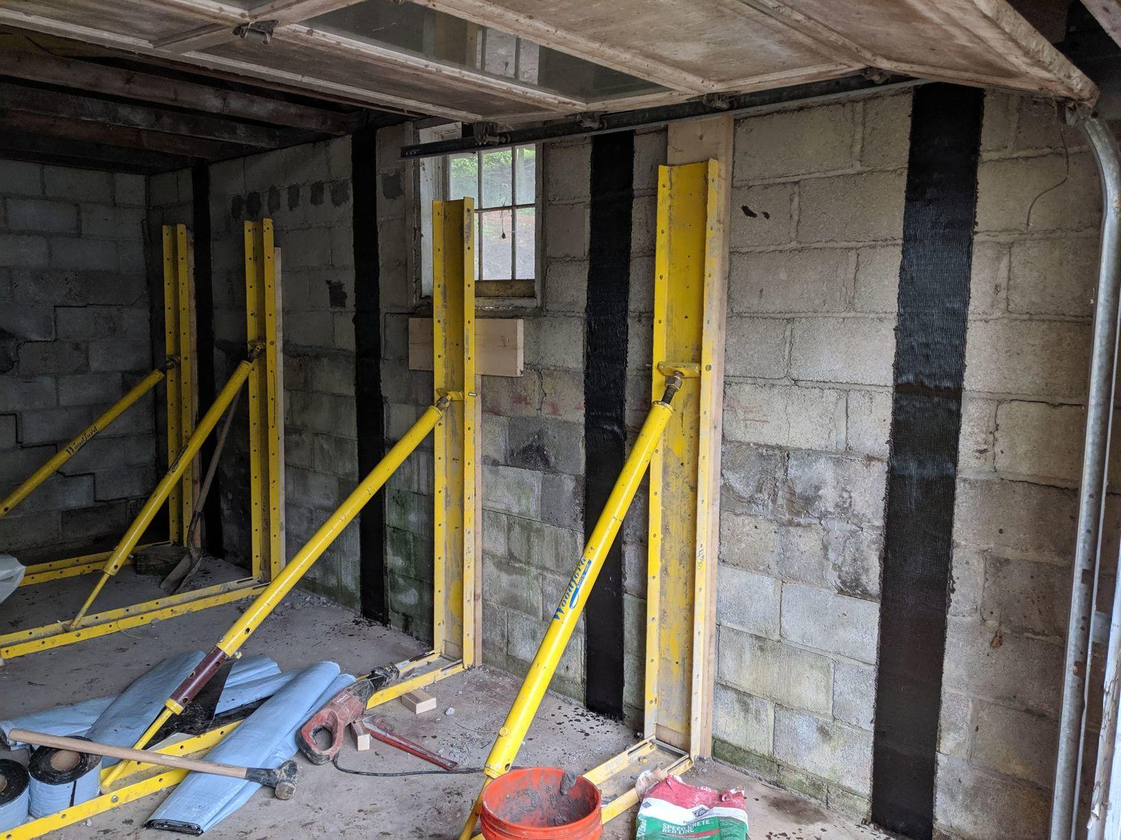 Foundation Repair - Woodford Wall Pushing System - Side view of carbon ...