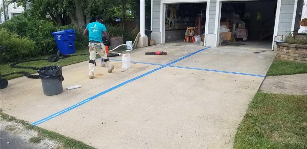 Concrete Lifting and Leveling - Concrete Driveway and Garage Floor ...