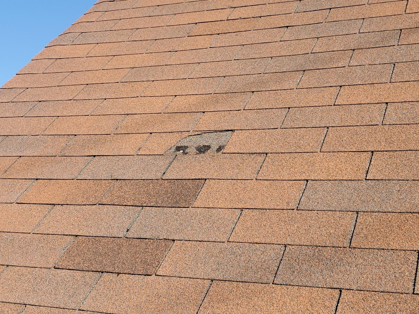 Excessive Storm Damage in Pawtucket, RI - The First of the Torn Shingles