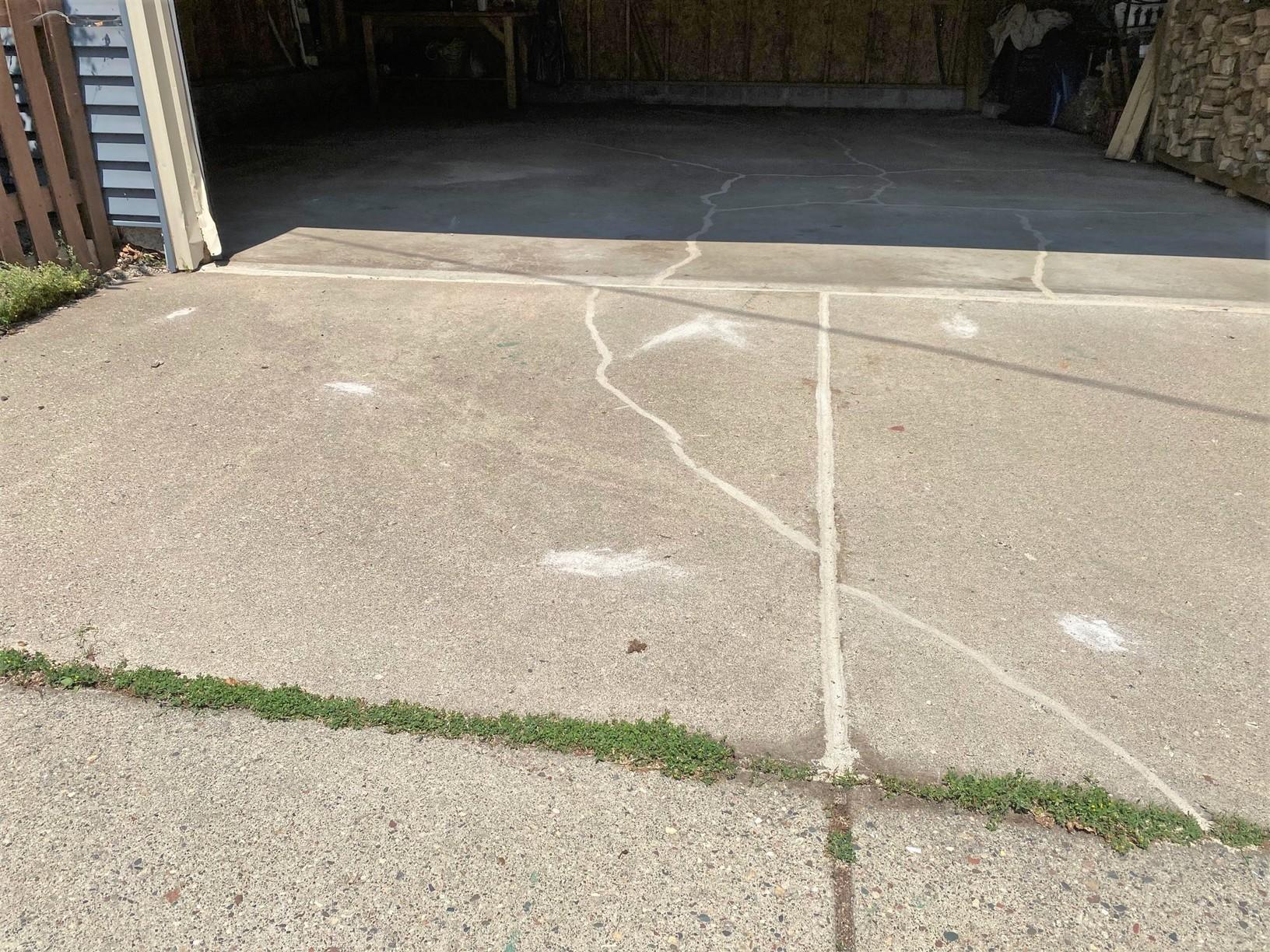 Concrete Lifting and Leveling - Cracked, Sunken Garage Concrete in ...