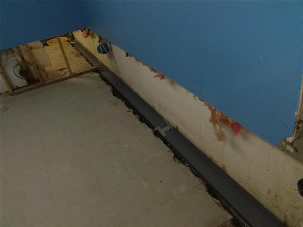 Basement Waterproofing - Installing a Basement Drain in Monmouth County ...